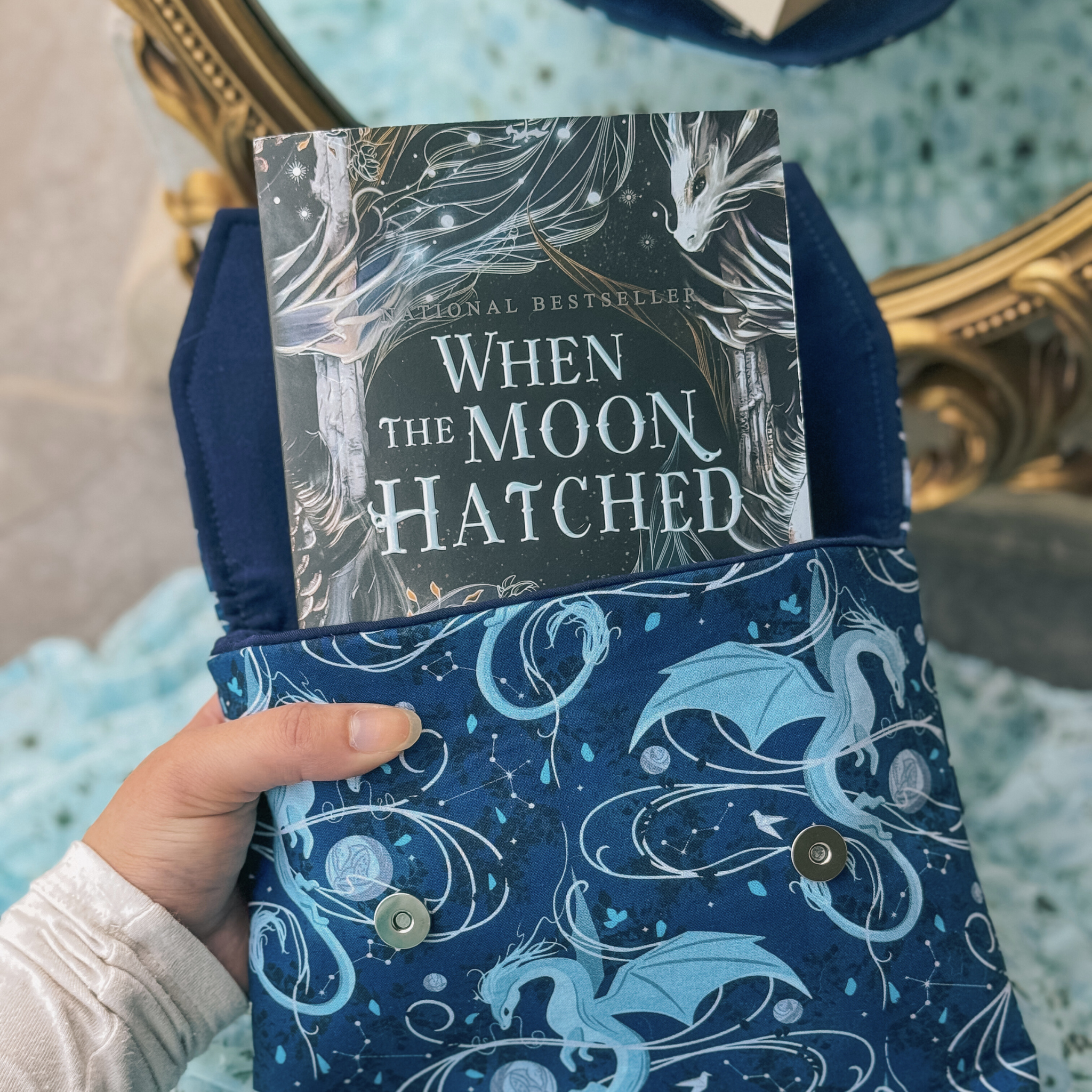 Moonplume Dragon padded book sleeve (When The Moon Hatched) – Charlie ...